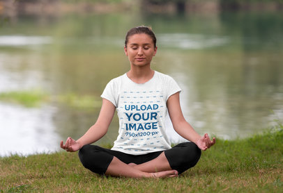 Placeit - Heathered T-Shirt Mockup of a Woman Doing a Yoga Pose Outdoors