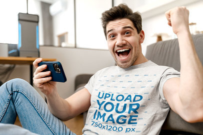 Placeit - T-Shirt Mockup of a Gamer Playing on the Computer