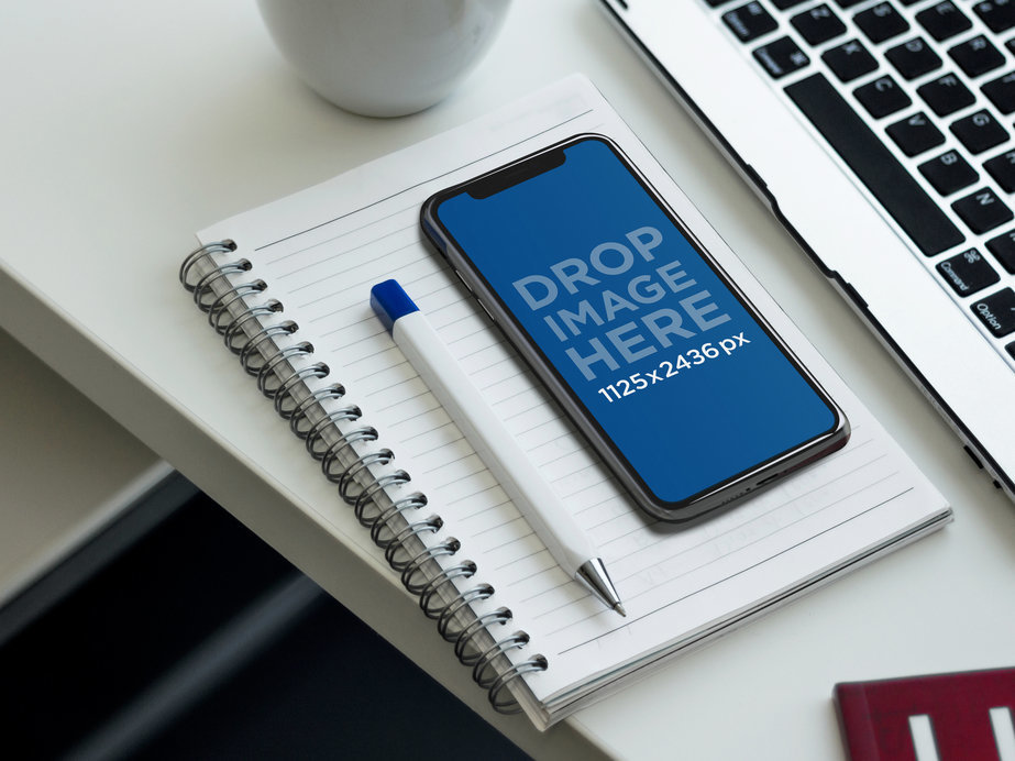 Placeit - Mockup of an iPhone 11 Pro Lying on an Office Desk