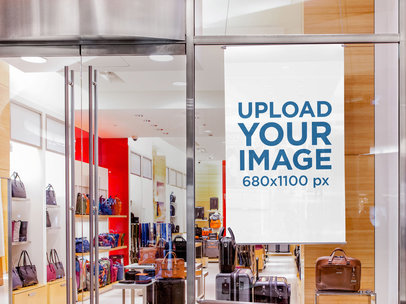 Placeit - Poster Mockup in the Store Window of a Mall