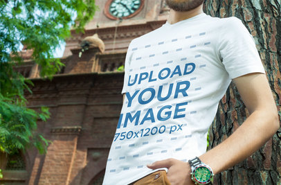 Placeit - V-Neck T-Shirt Mockup Featuring a Man Posing by a Wall with ...