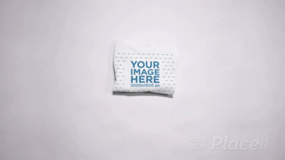 Placeit - Hoodie Unfolding Itself on a White Surface in Stop Motion