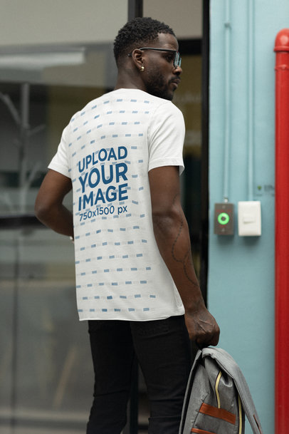 Placeit - Back View Mockup of a Man Wearing an Oversized Tee