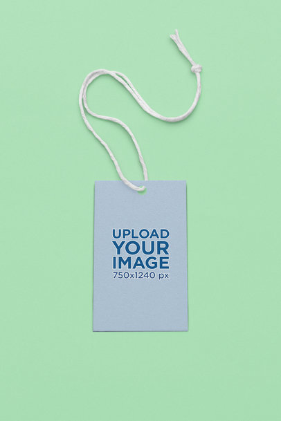 Placeit - Brand Tag Mockup Featuring a Hoodie Placed on a Customizable ...