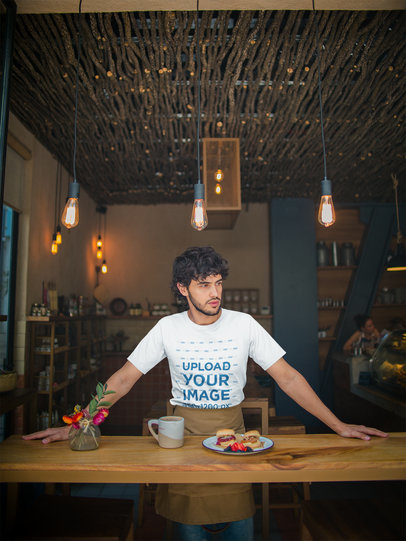 Placeit - T-Shirt Mockup of a Waiter Posing at a Restaurant