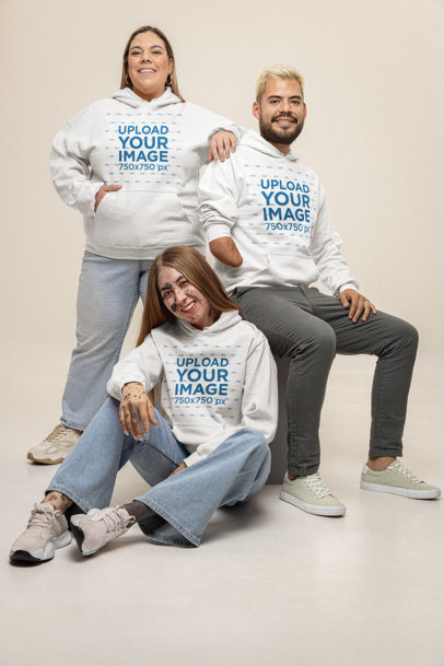 Placeit - Gildan Pullover Hoodie Mockup of a Joyful Couple Posing ...