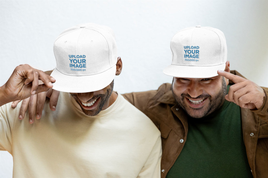 Placeit - Mockup of Two Happy Friends Wearing Matching Snapback Hats