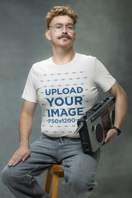 Placeit - Bella Canvas T-Shirt Mockup Featuring a Man Posing for an ...