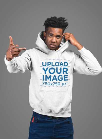 Placeit - Pullover Hoodie Mockup Featuring a Stylish Man in a Studio