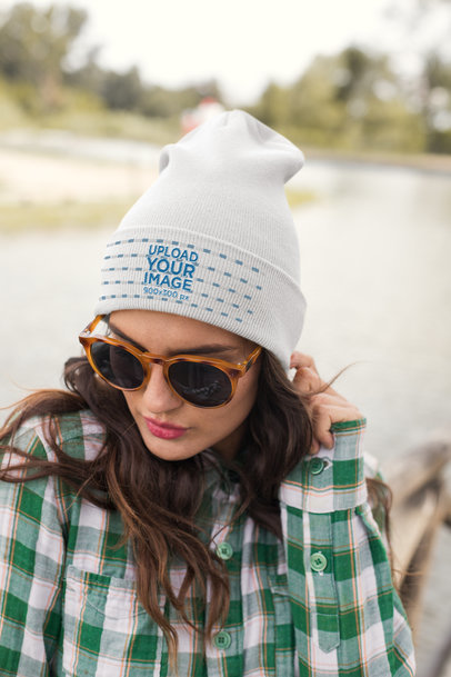 Placeit - Beanie Mockup Featuring a Serious Brunette Woman