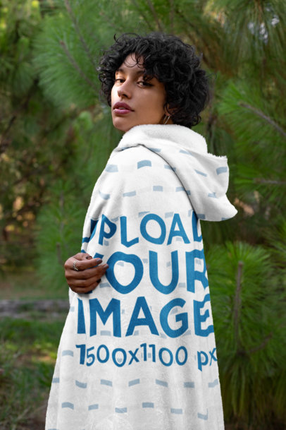Placeit - Hooded Fleece Blanket Mockup of a Woman in Nature