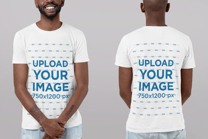 Placeit - Front and Back T-Shirt Mockup of a Man at a Studio Looking Down