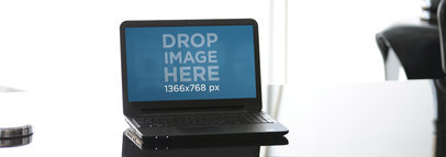Placeit - Laptop Mockup Featuring a Businessman at the Office Working ...