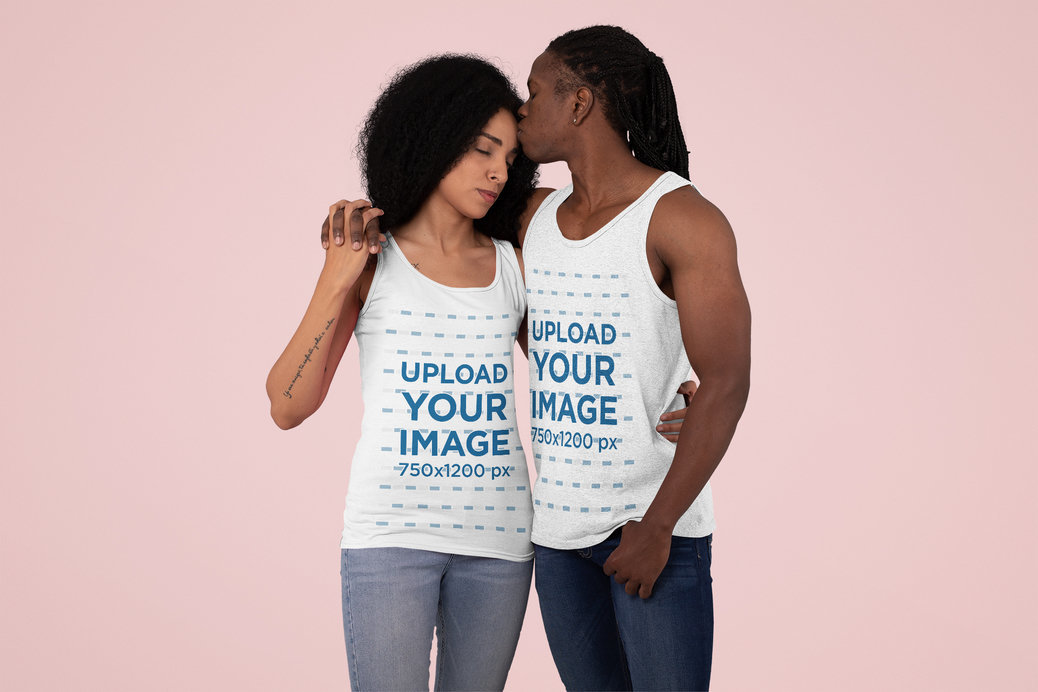 Placeit - Mockup of a Couple Wearing Tank Tops in a Studio
