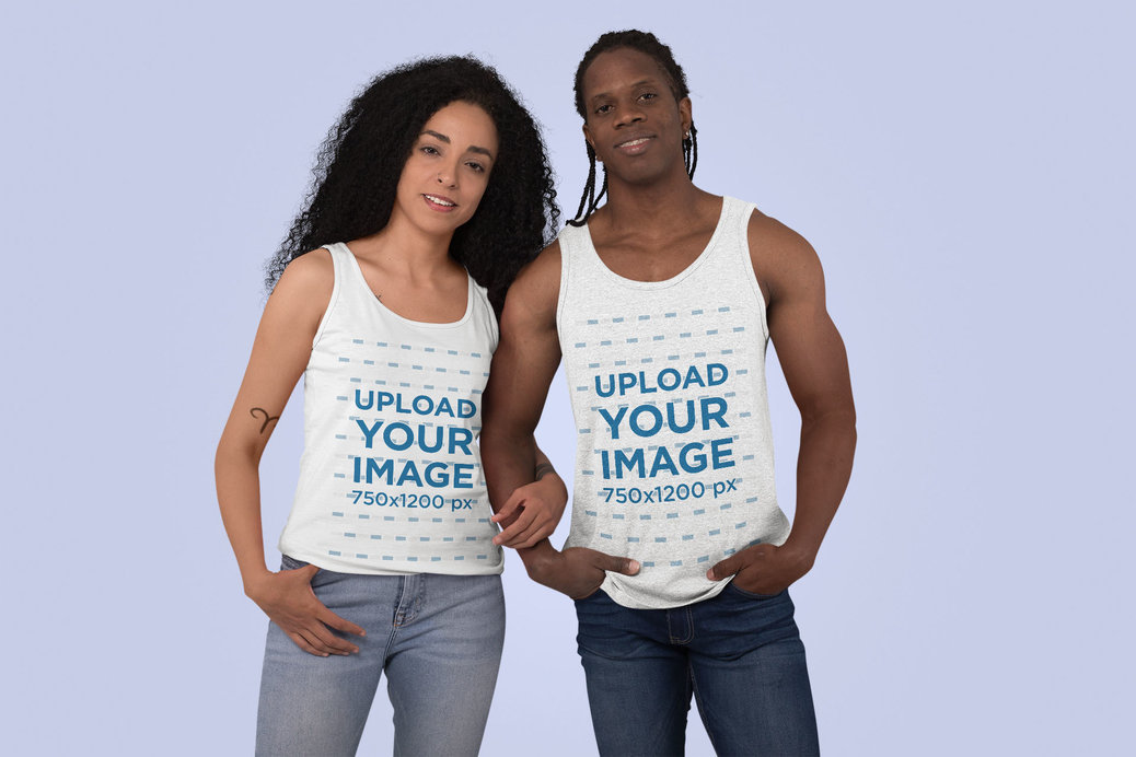 Placeit - Mockup of a Smiling Couple Wearing Tank Tops in a Studio