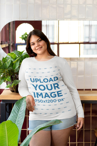 Placeit - Plus Size Tee Mockup of a Happy Woman in a Cool Restaurant