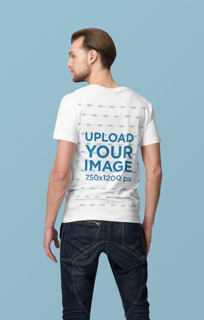 Placeit - Back View T-Shirt Mockup Featuring a Man in a Studio Setting