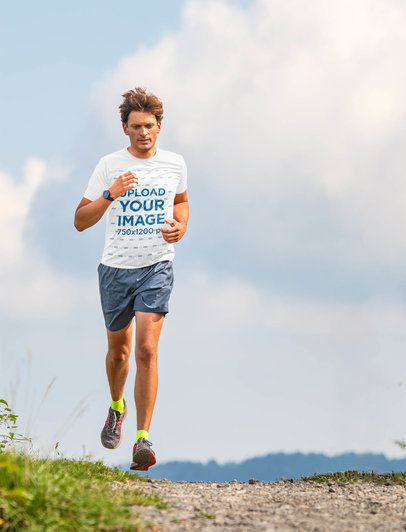 Placeit - Transparent T-Shirt Mockup of a Male Runner Training Outdoors