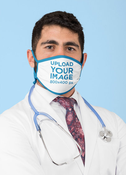 Placeit - Mockup Featuring a Health Worker Wearing a Sublimated Face Mask