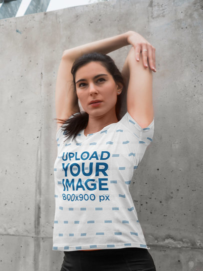 Placeit - Sublimated V-Neck T-Shirt Mockup of a Woman with Open Arms