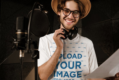 Placeit - Mockup of a Male Singer Wearing a T-Shirt in a Studio